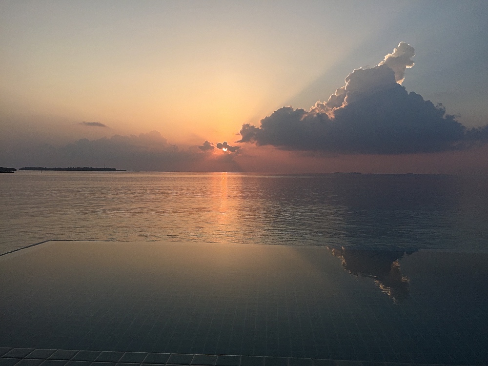 Sunset over the plunge pool. - Free Two Roam